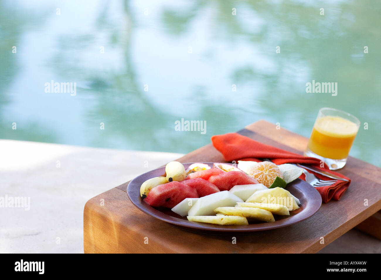 plates with fruits and juice Stock Photo - Alamy
