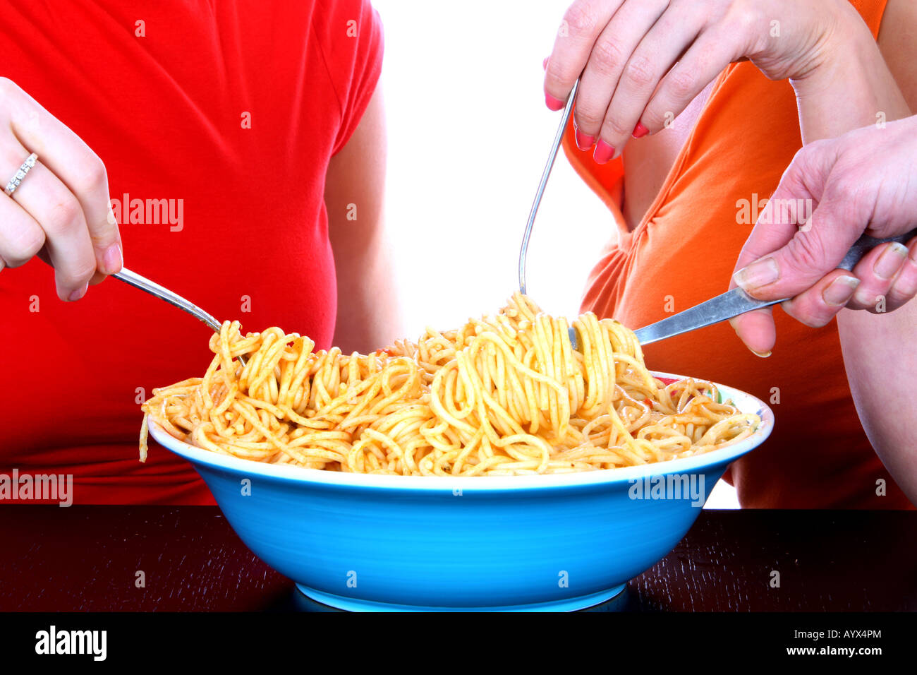 Young Women Eating Spaghetti Model Released Stock Photo - Alamy