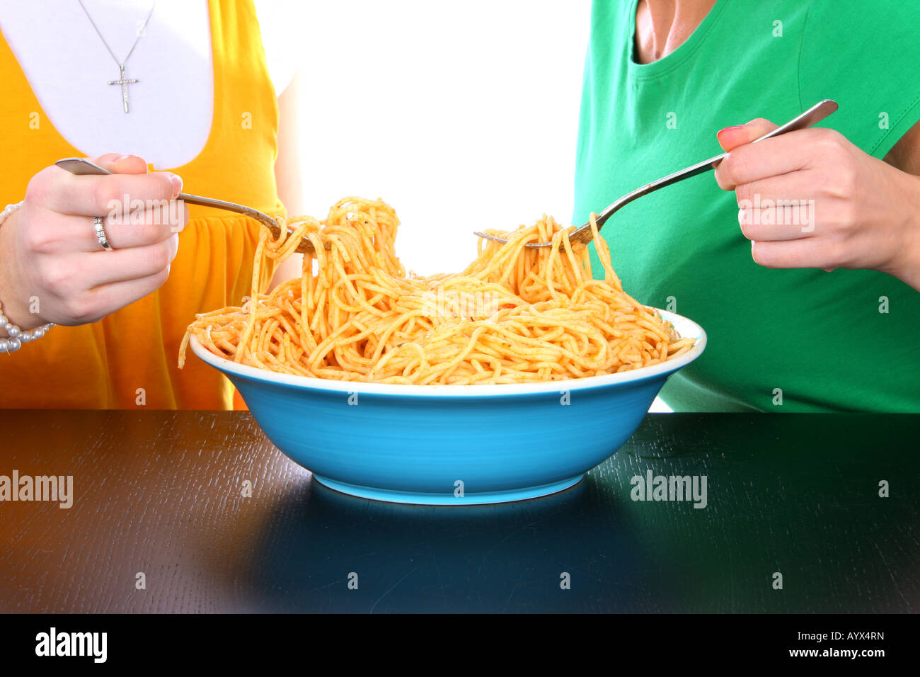 Young Women Eating Spaghetti Model Released Stock Photo - Alamy