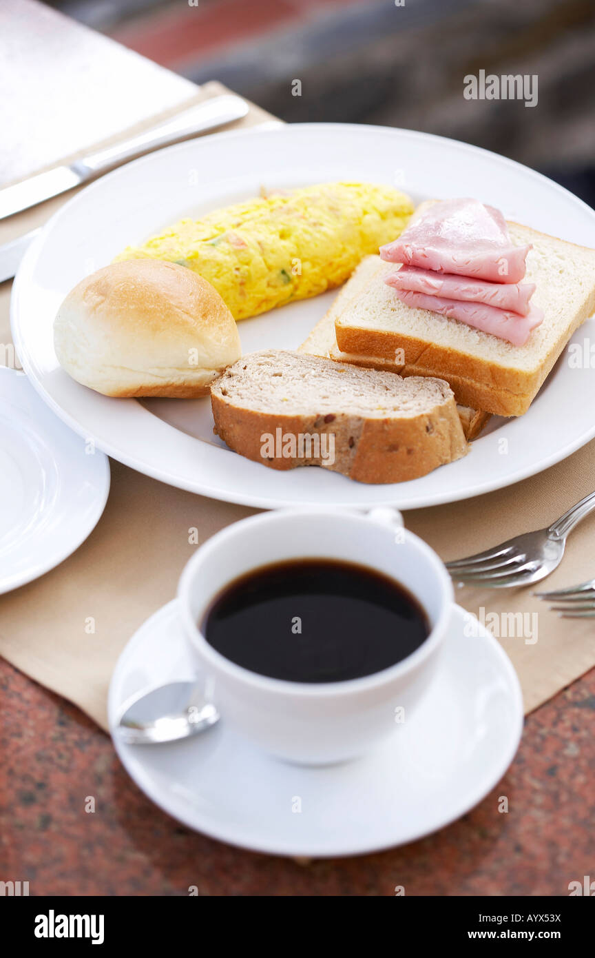 coffee cup and plate with bread Stock Photo - Alamy