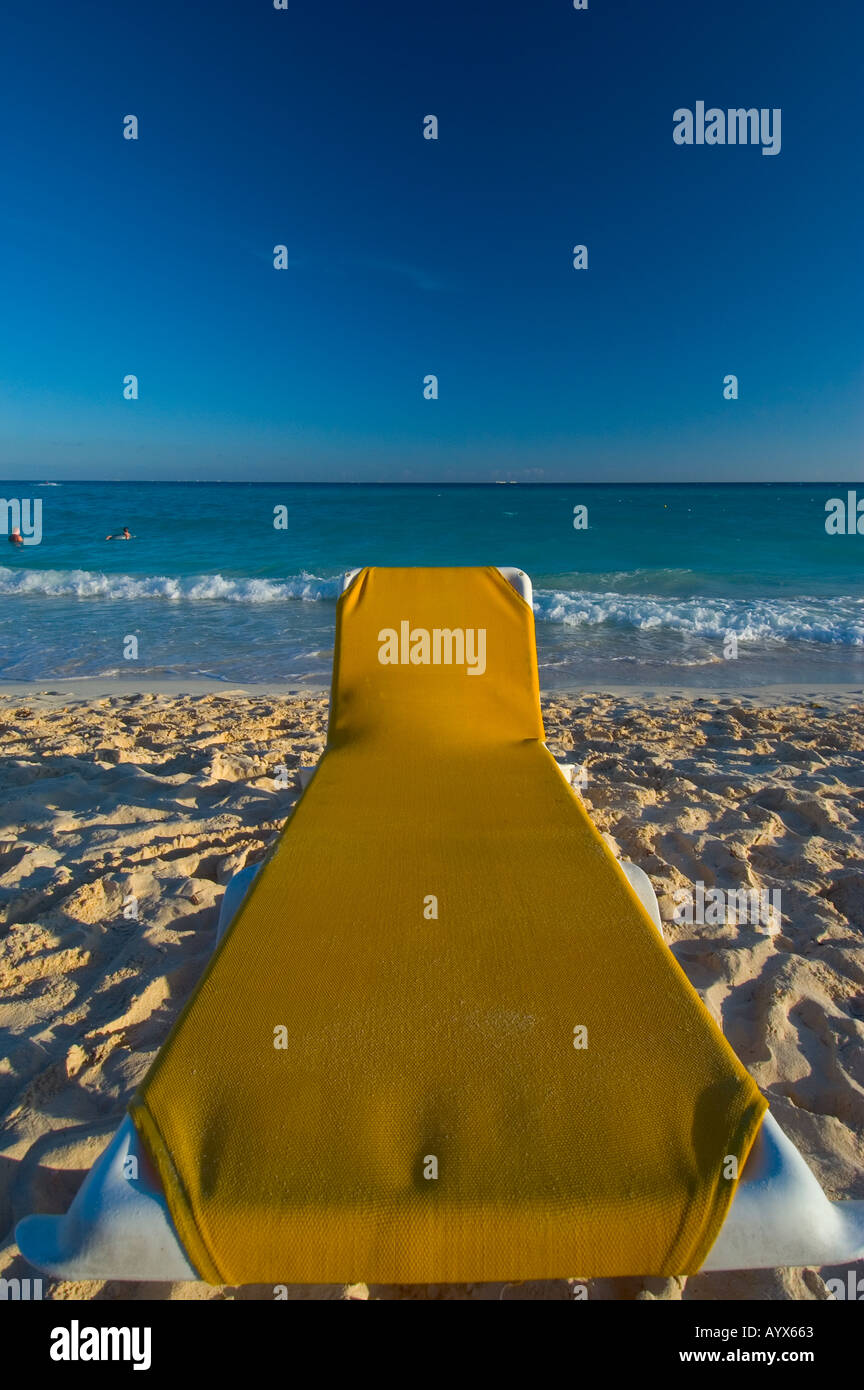 Yellow beach chair Caribbean Mexico Cancun Tulum Stock Photo - Alamy