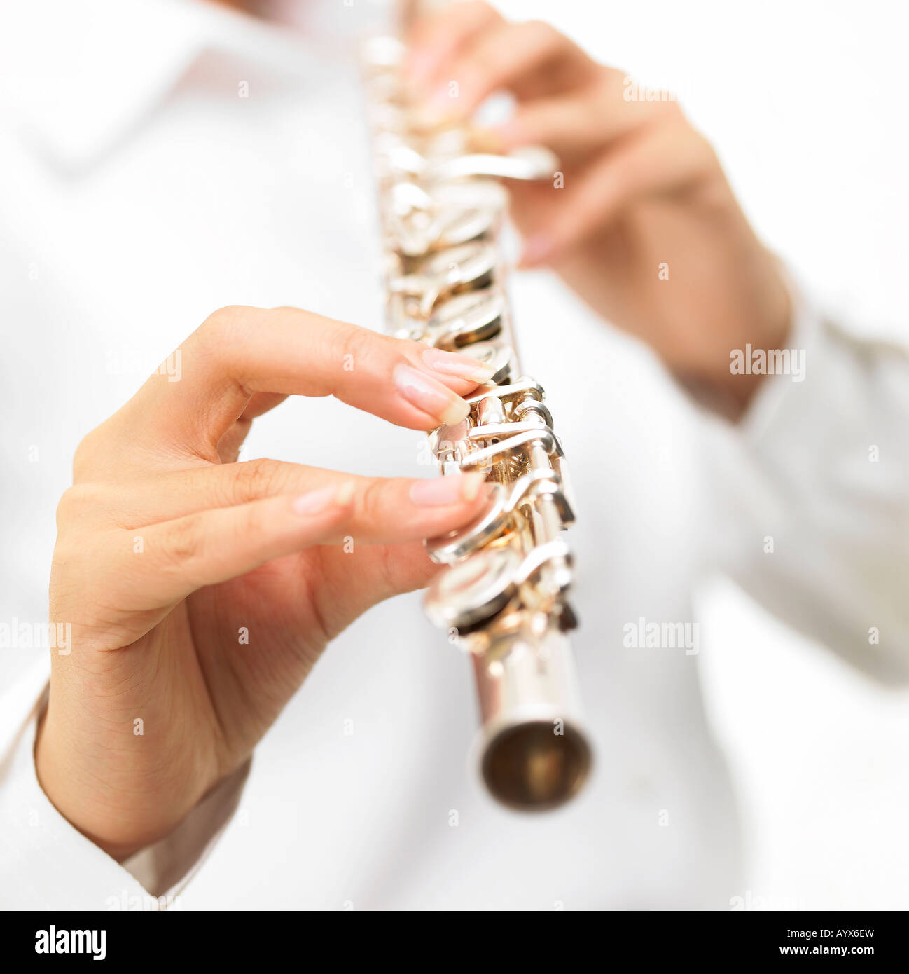 hands of man blowing flute Stock Photo - Alamy