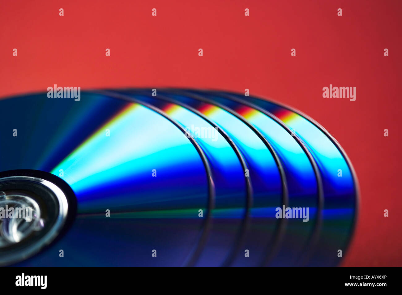 CD on red background Stock Photo - Alamy