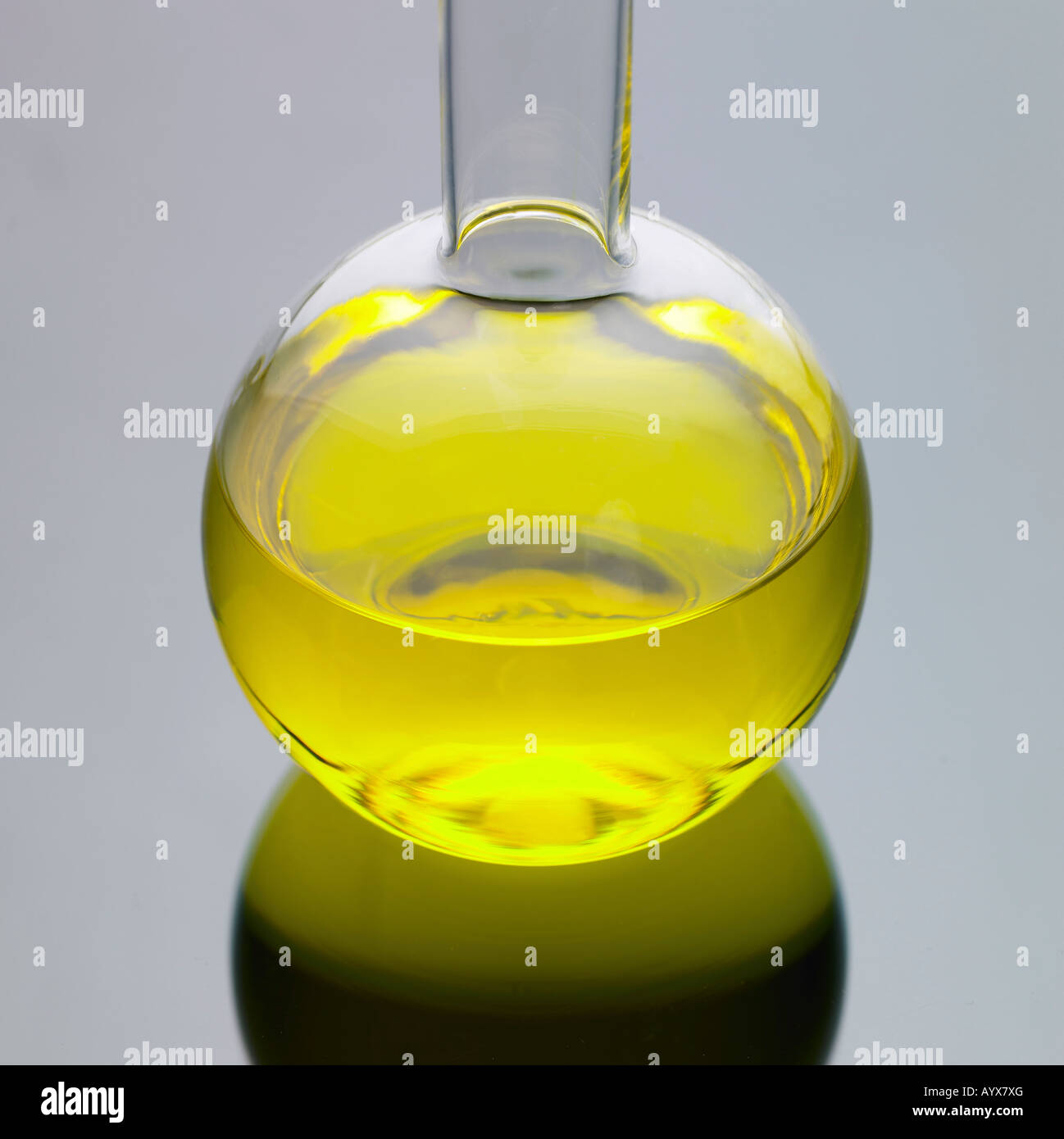 flask with yellow fluid Stock Photo - Alamy