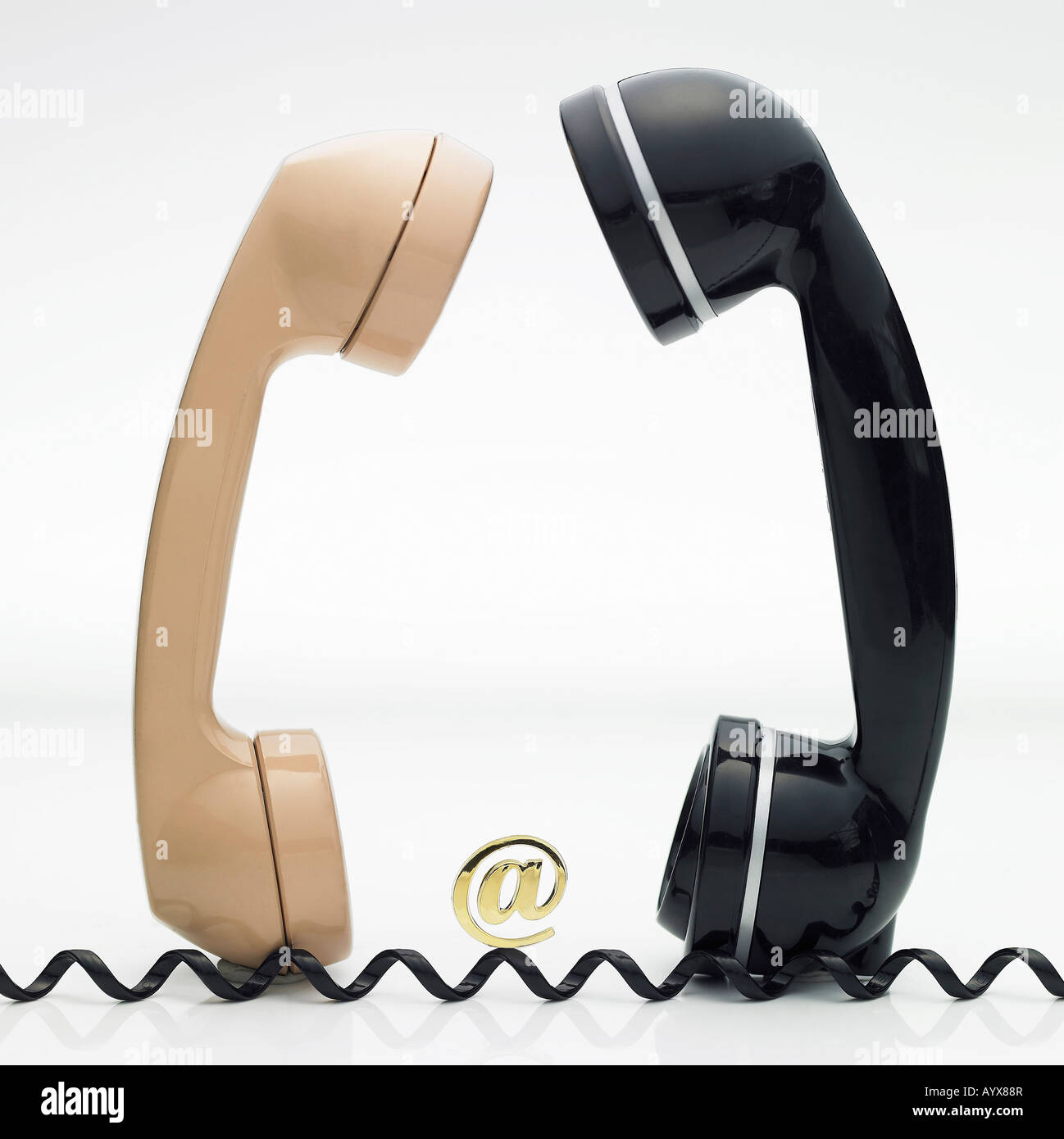 telephone line and receiver facing each other Stock Photo - Alamy