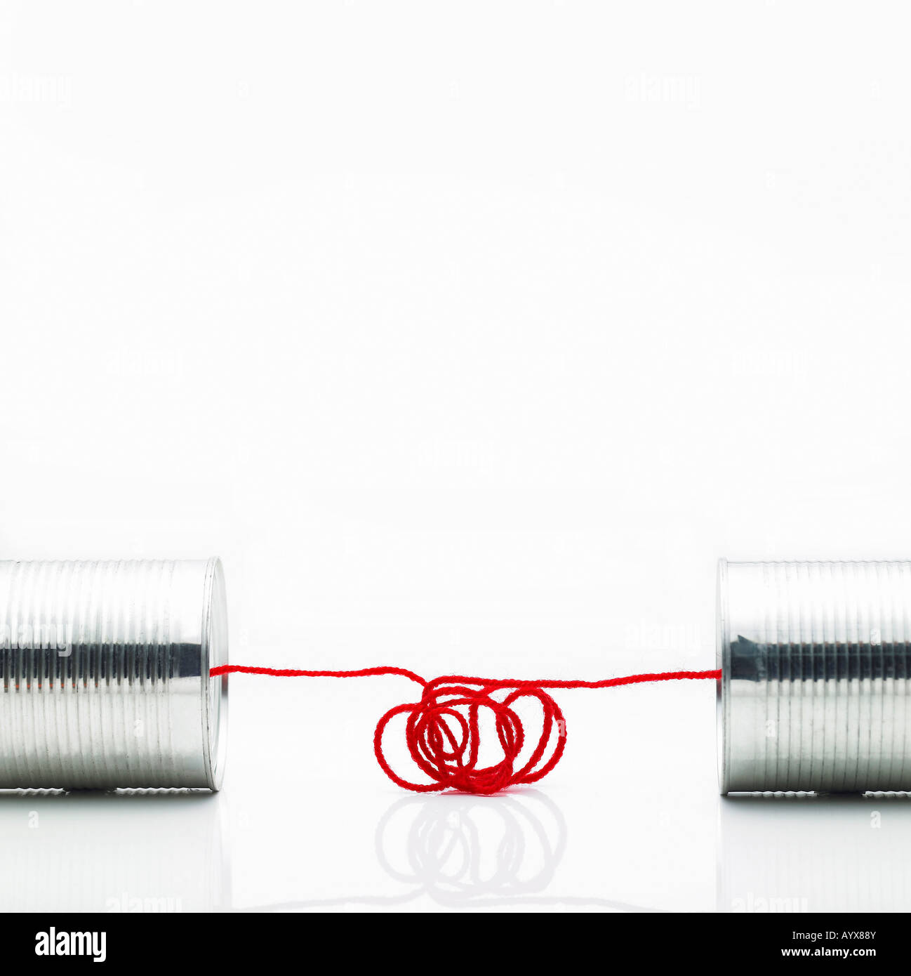 can connected with red thread Stock Photo - Alamy