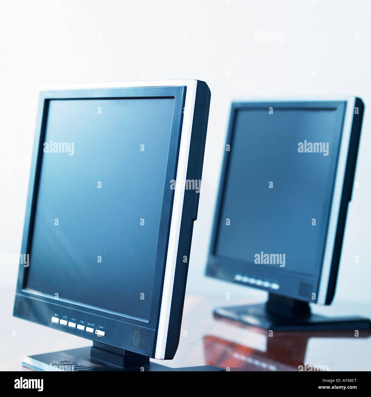arrayed monitors on white background Stock Photo - Alamy
