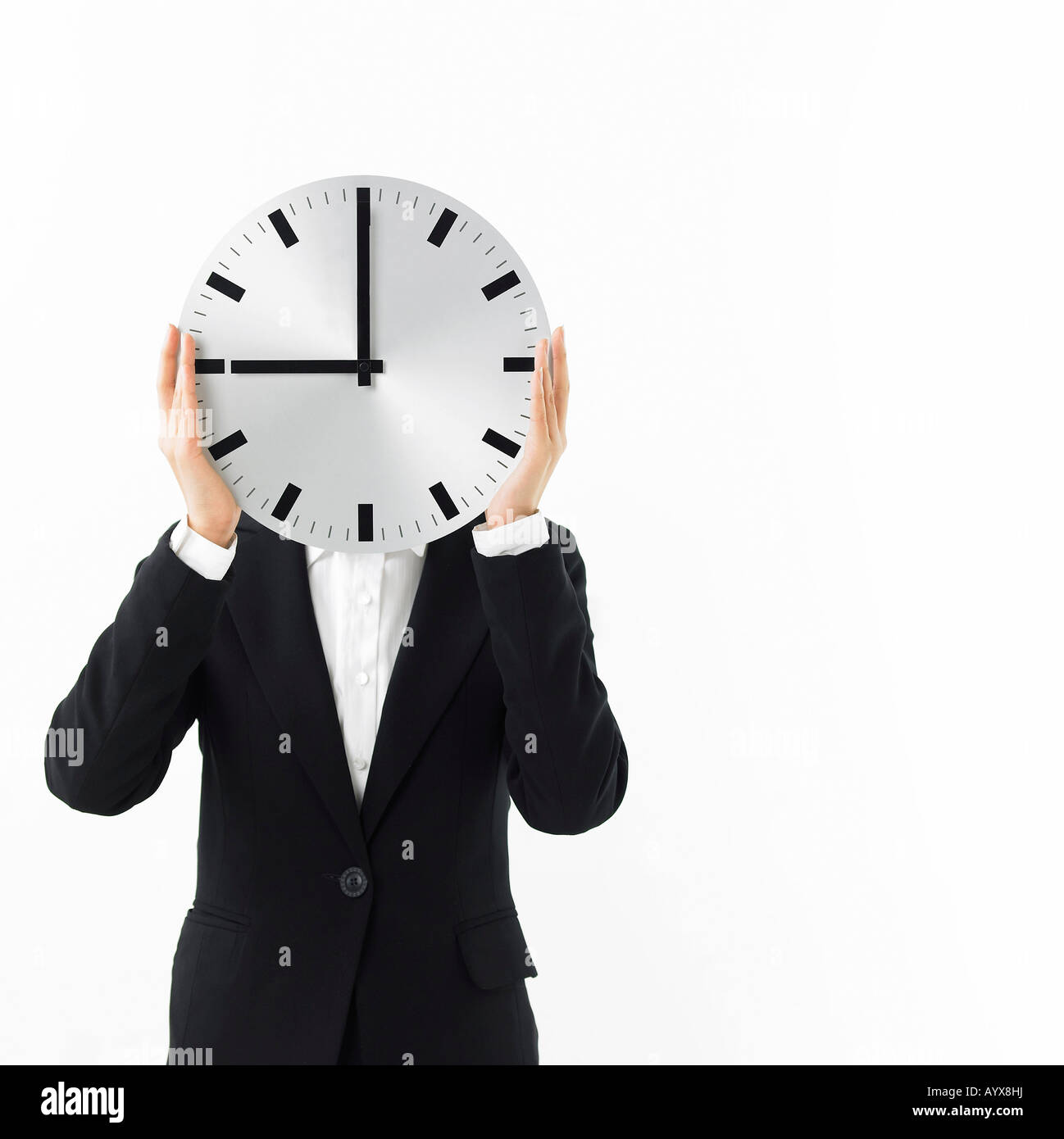 man holding clock Stock Photo - Alamy