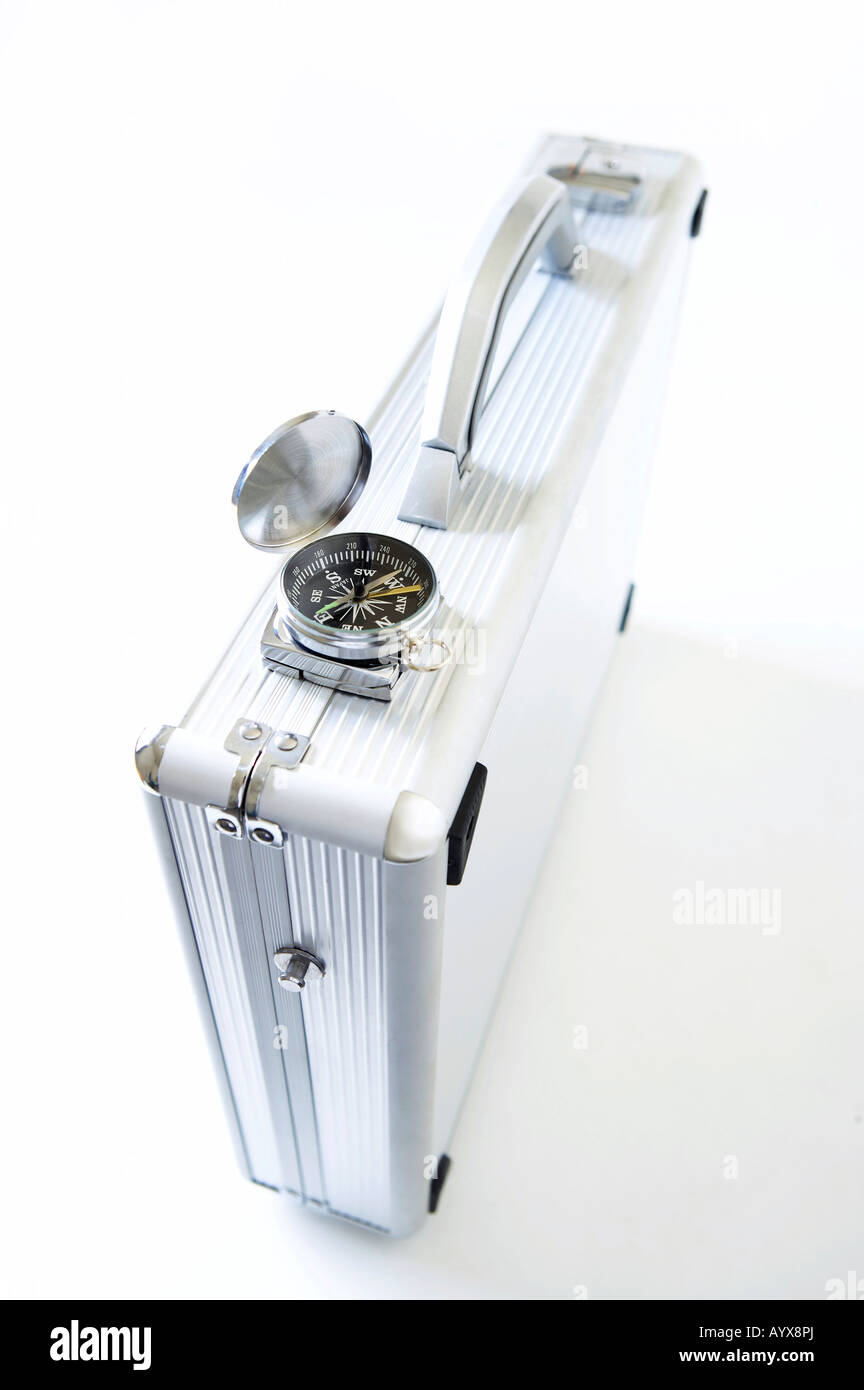 bag and compass on the white background Stock Photo - Alamy