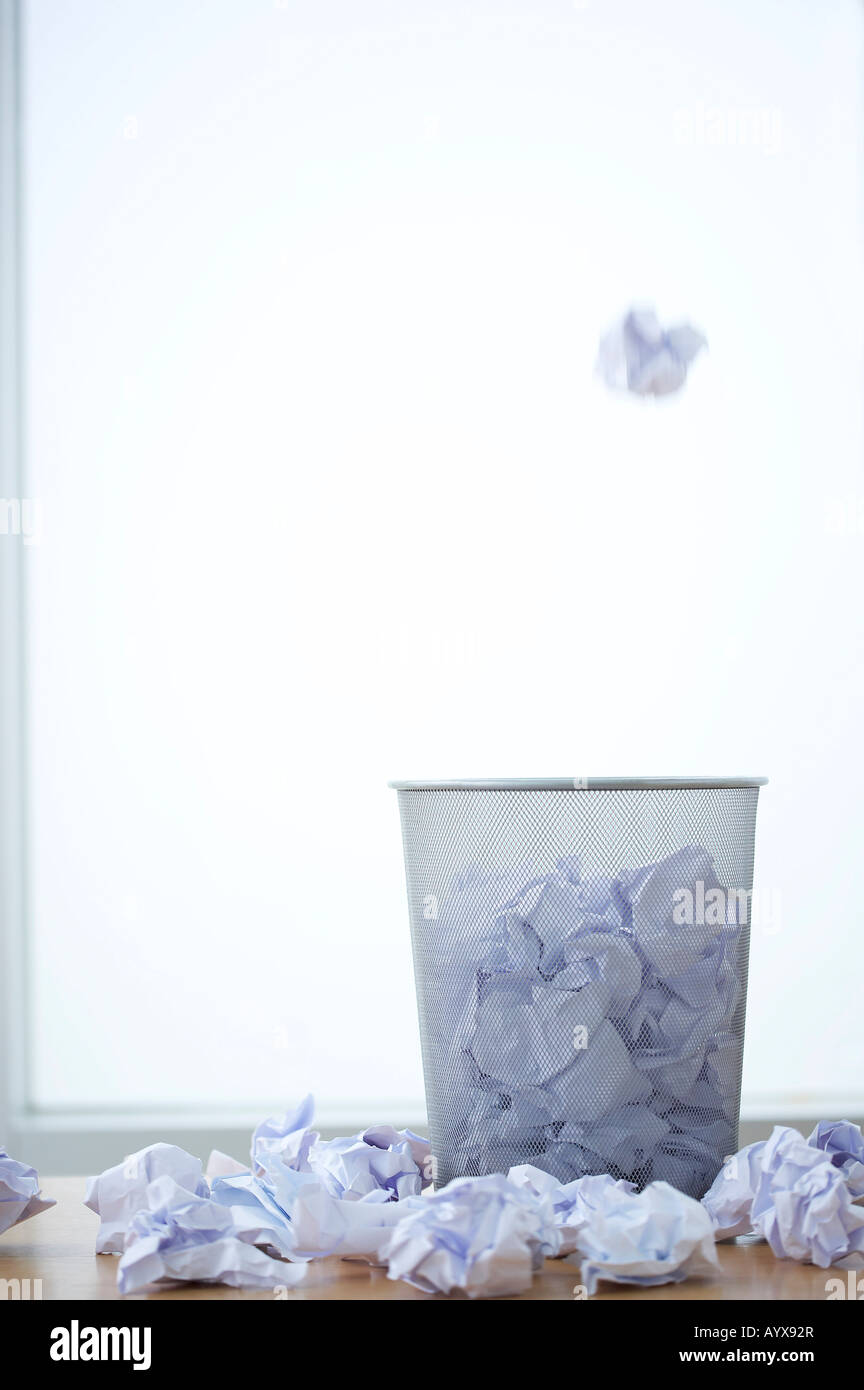 trash box with bundle of paper Stock Photo - Alamy