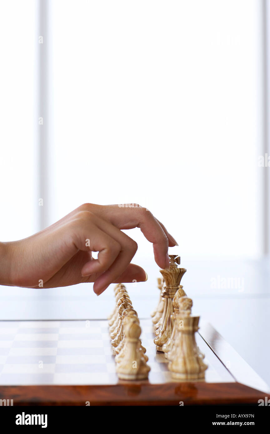 hand playing chess Stock Photo - Alamy