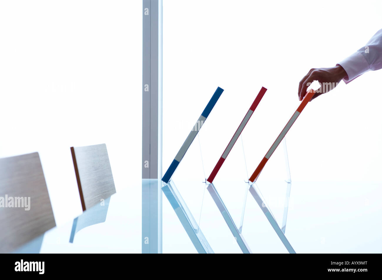 hand taking out documents Stock Photo - Alamy