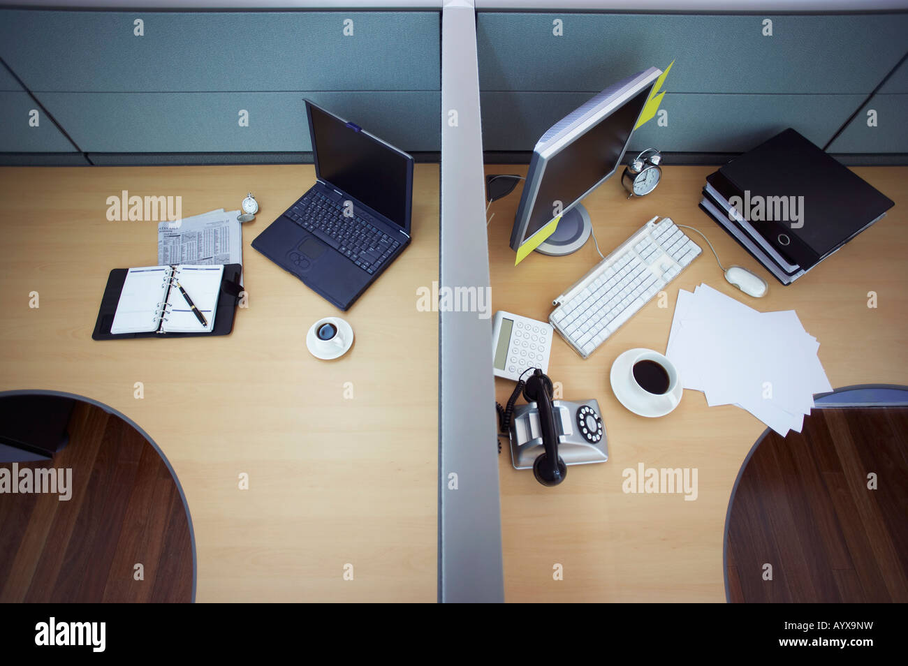 computer and desk with stacks of documents at high angle Stock Photo ...