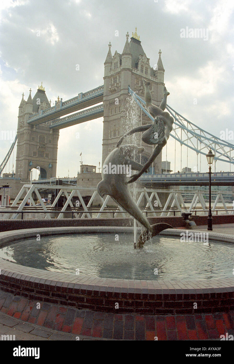 Dolphin and Girl Statue in Front of Tower Bridge London Stock Photo - Alamy