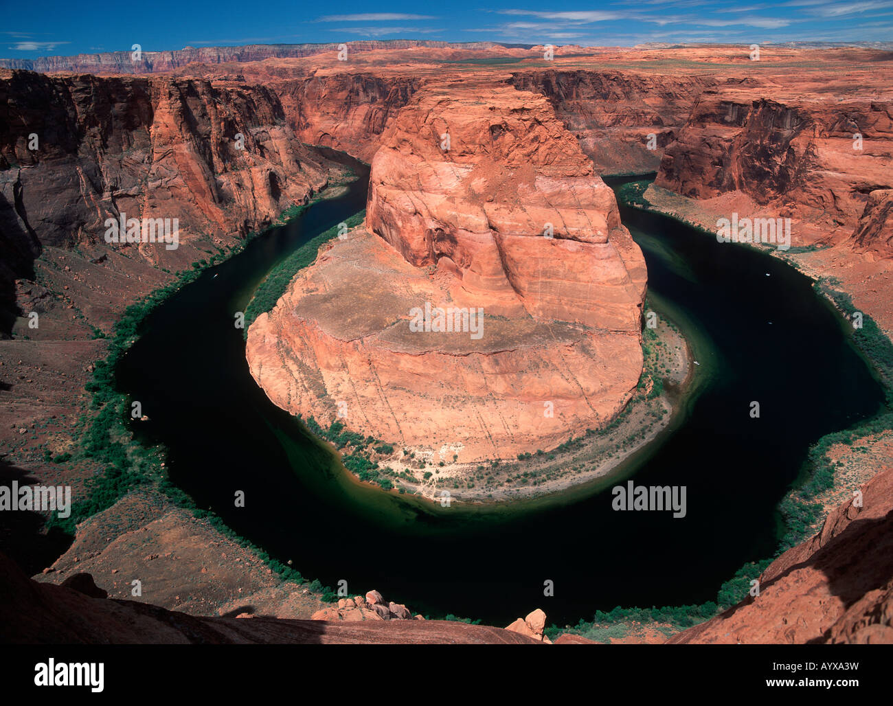 Colorado River circles bends around a sandstone island near the ...