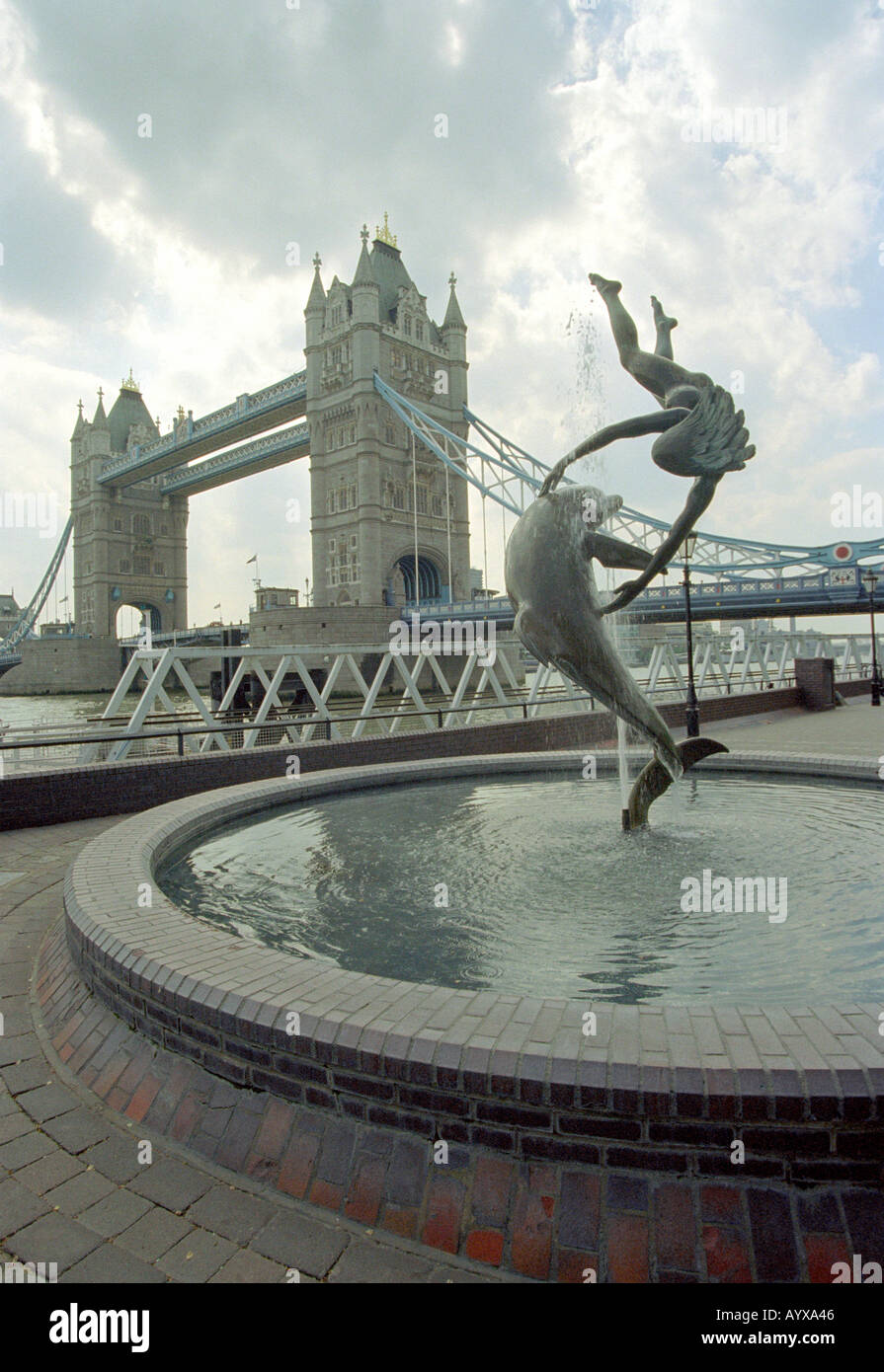 Dolphin and Girl Statue in Front of Tower Bridge, London, UK Stock ...