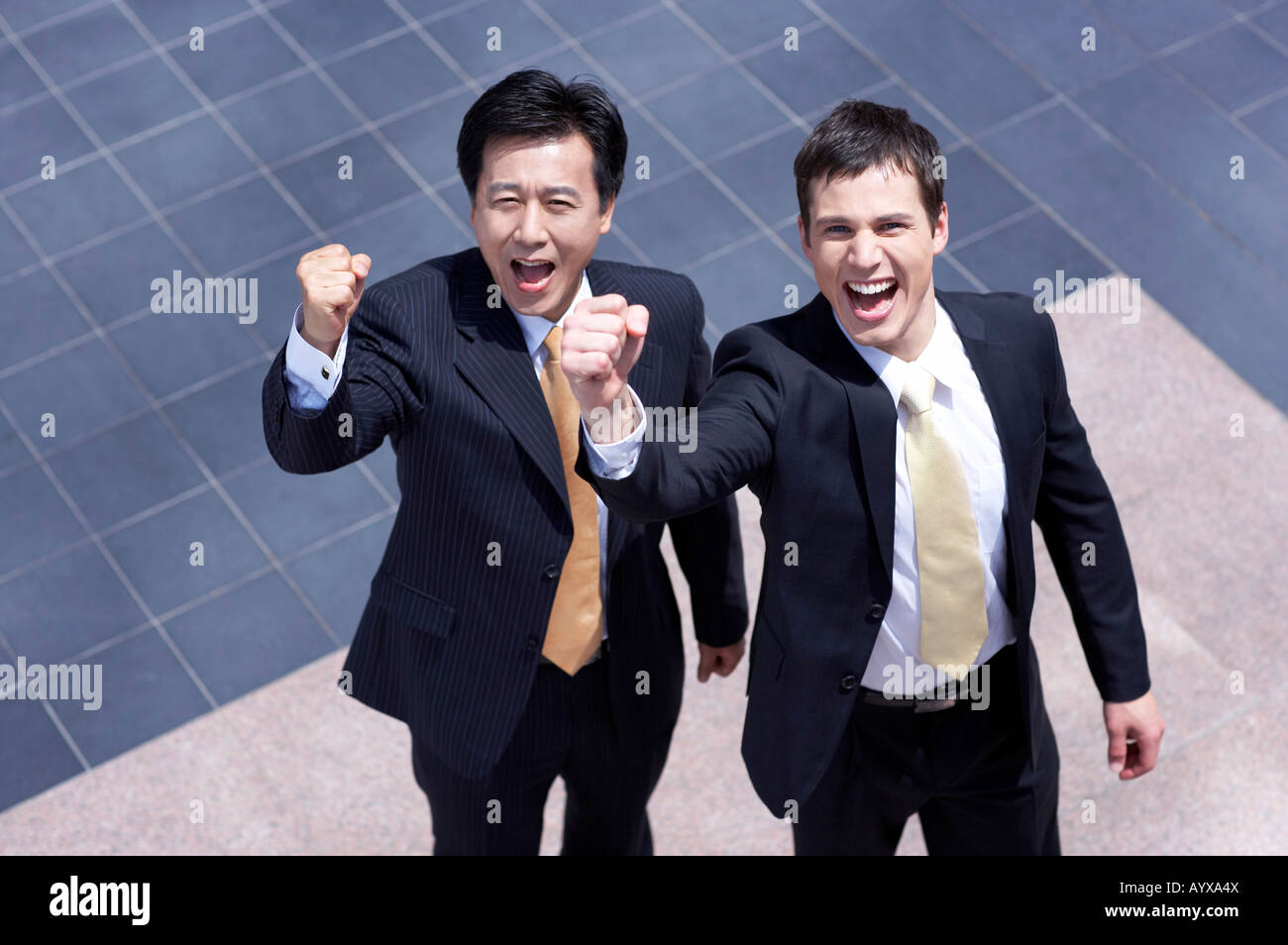 cheering man with confidence expression Stock Photo - Alamy