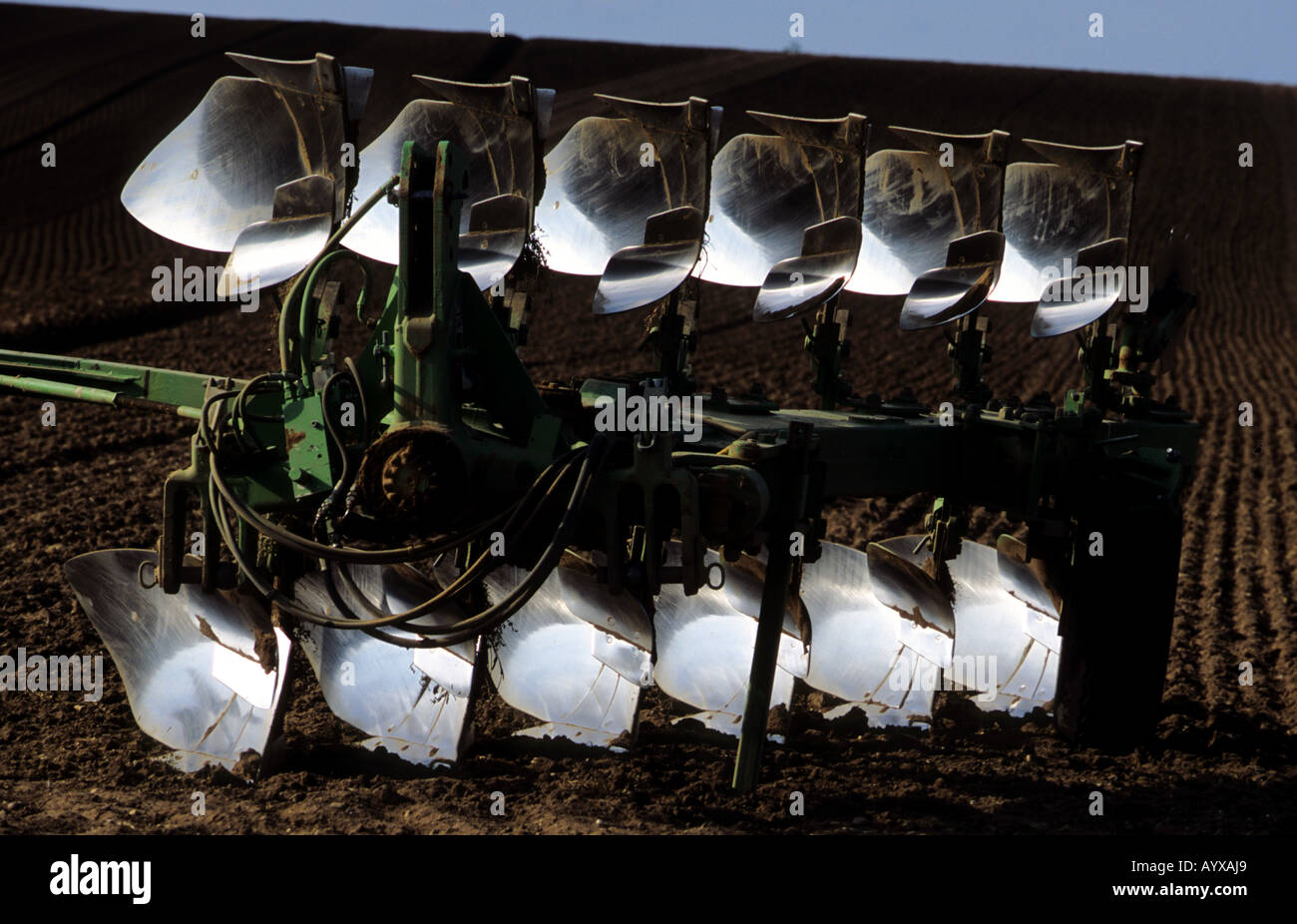 Modern six-farrow reversible plough, Butley, Suffolk, UK Stock Photo ...