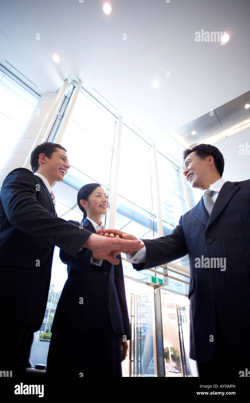 cheering men with gathering hands Stock Photo - Alamy