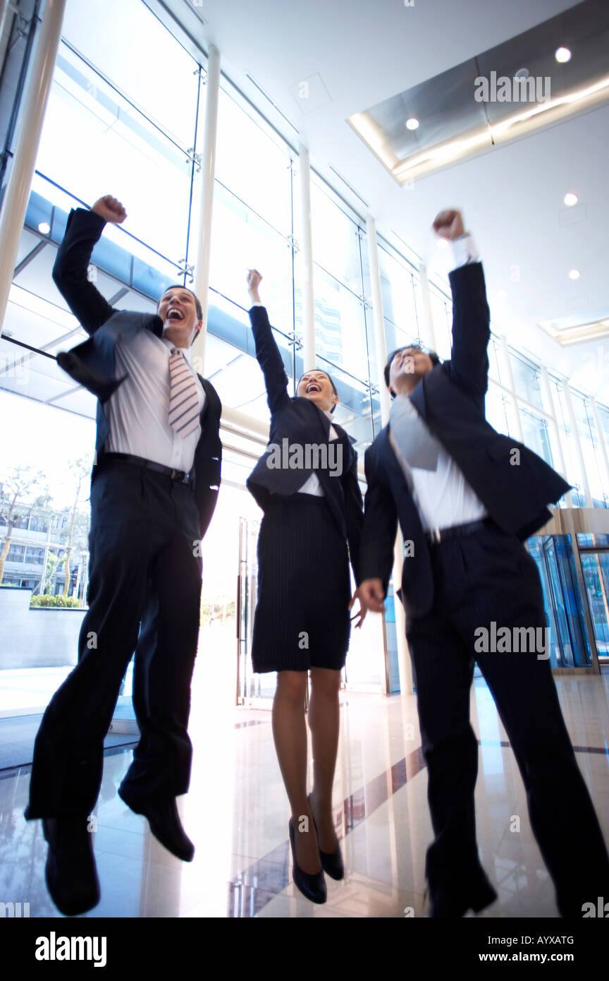 jumping man and woman and doing high five Stock Photo - Alamy
