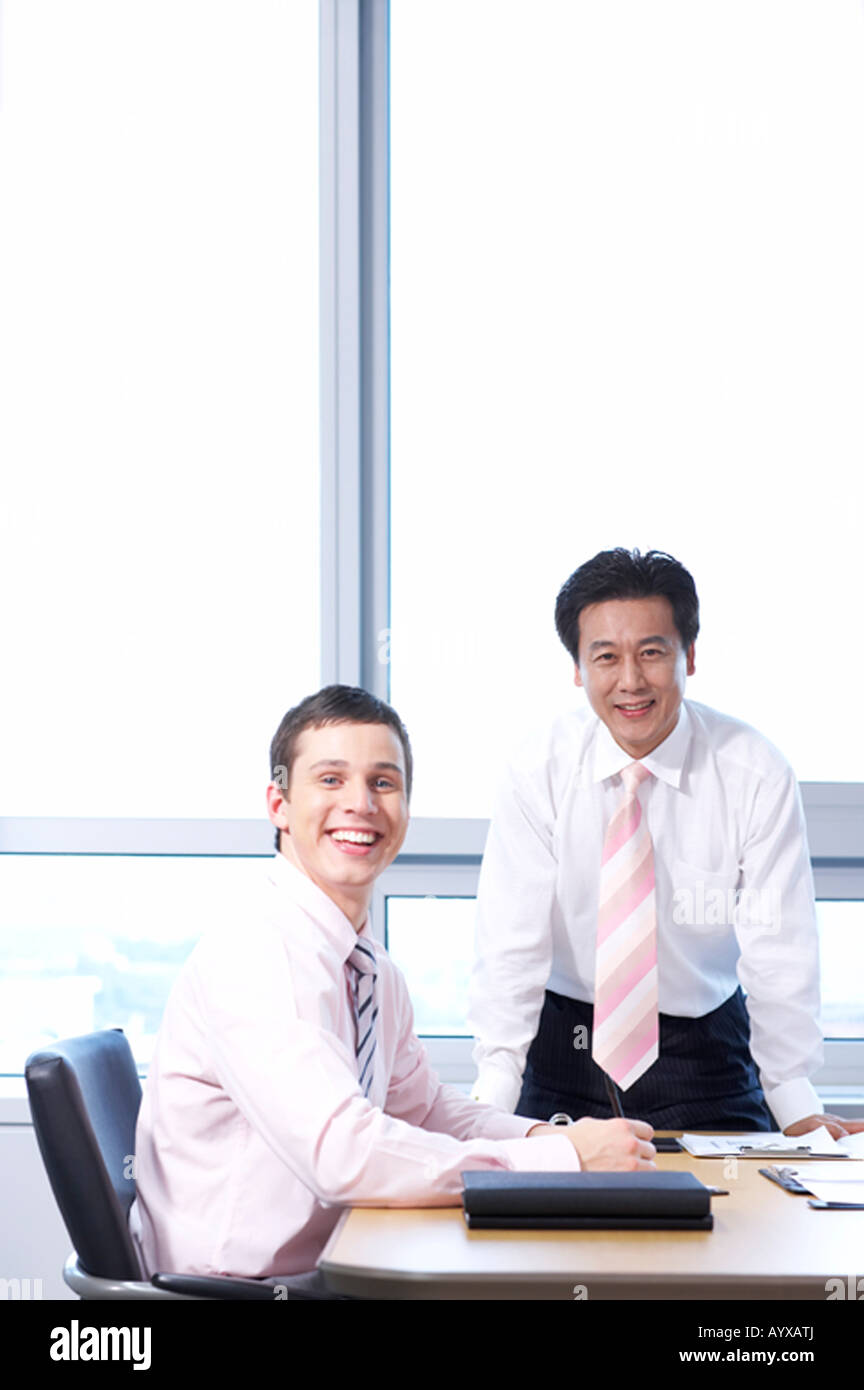 smiling men in the office Stock Photo - Alamy