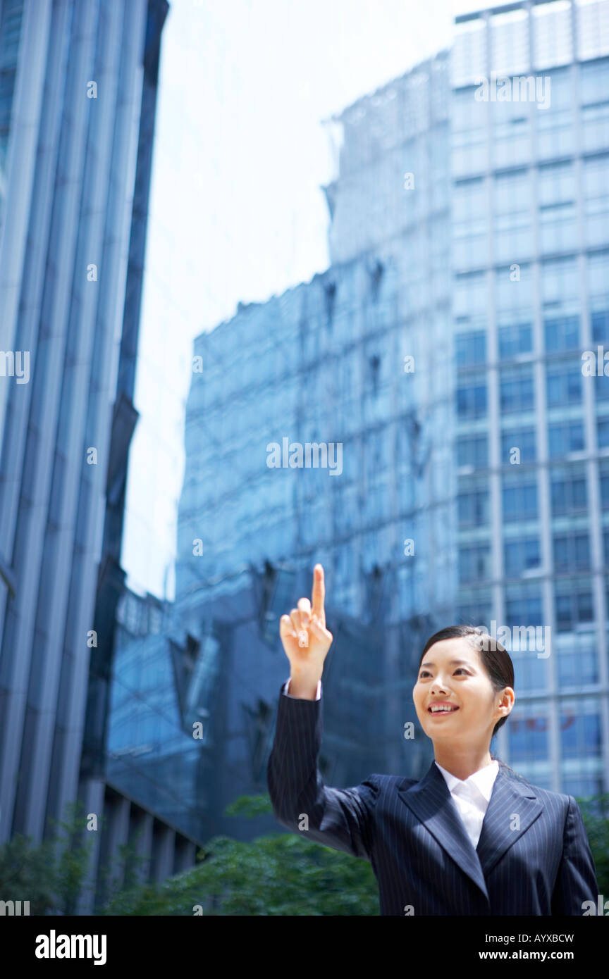 a woman raising her second finger Stock Photo - Alamy