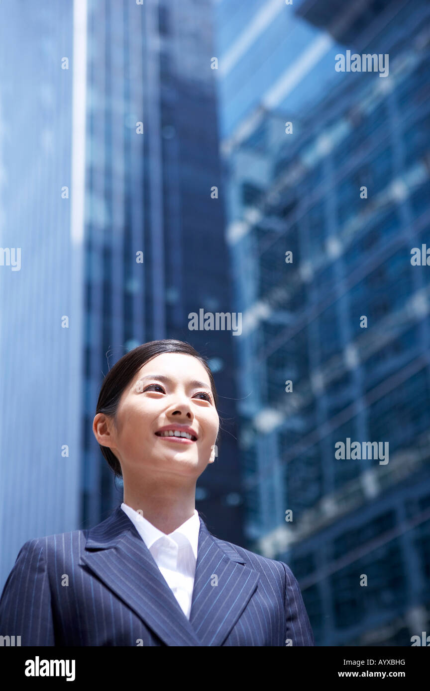 a woman's bust shot wearing suit Stock Photo - Alamy