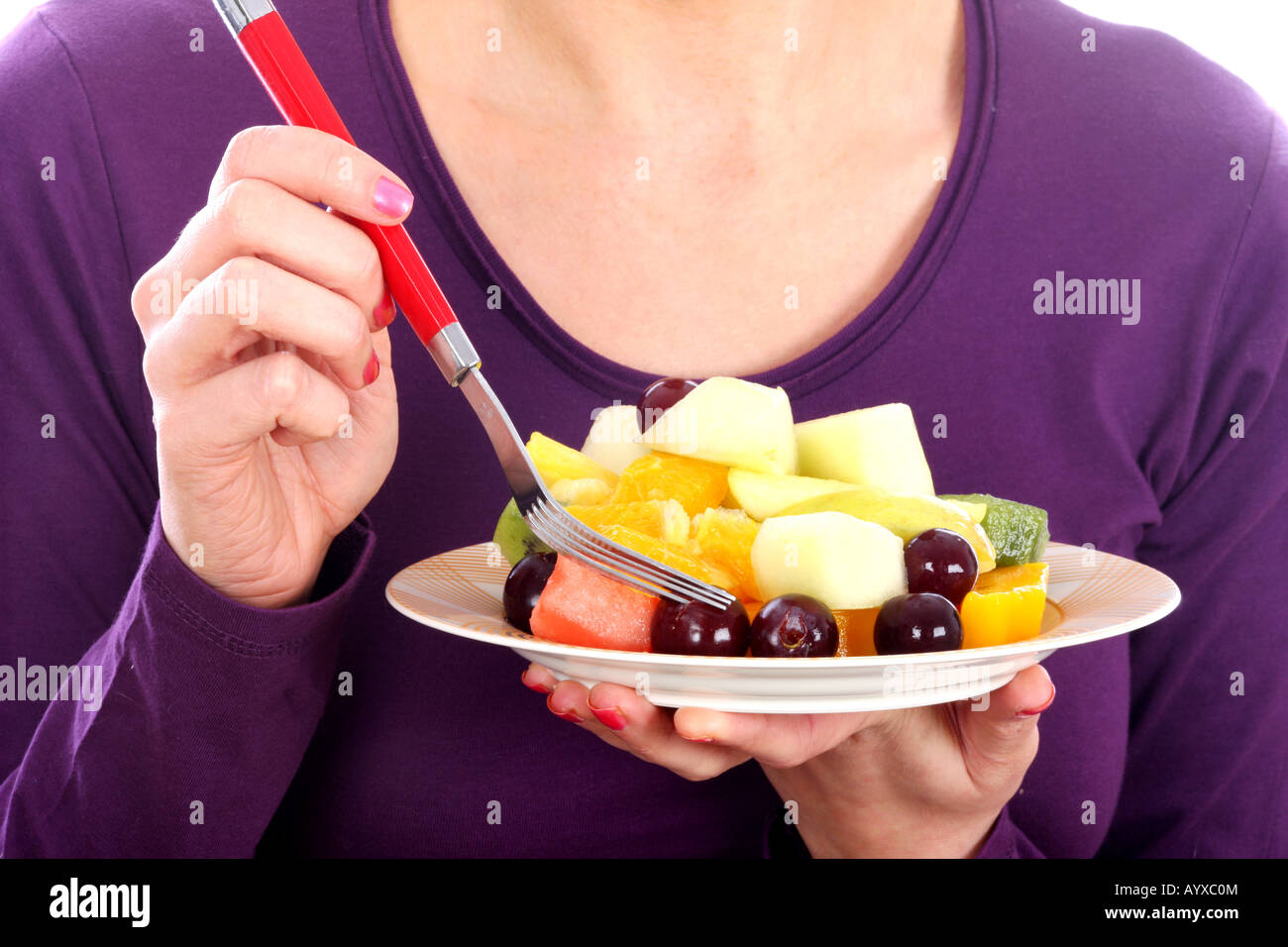 Young Woman Eating Fruit Salad Model Released Stock Photo - Alamy