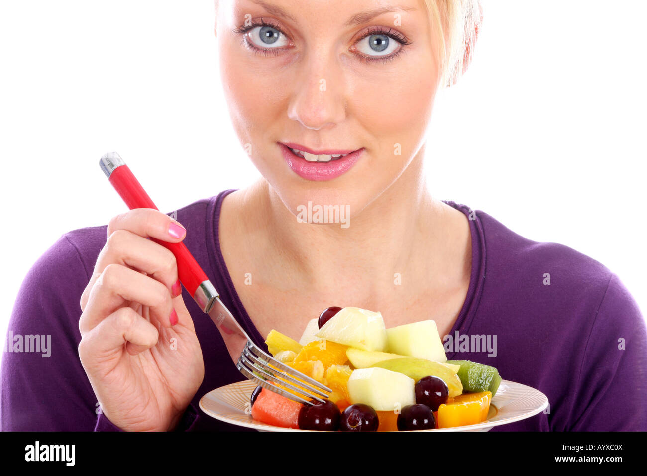 Young Woman Eating Fruit Salad Model Released Stock Photo - Alamy