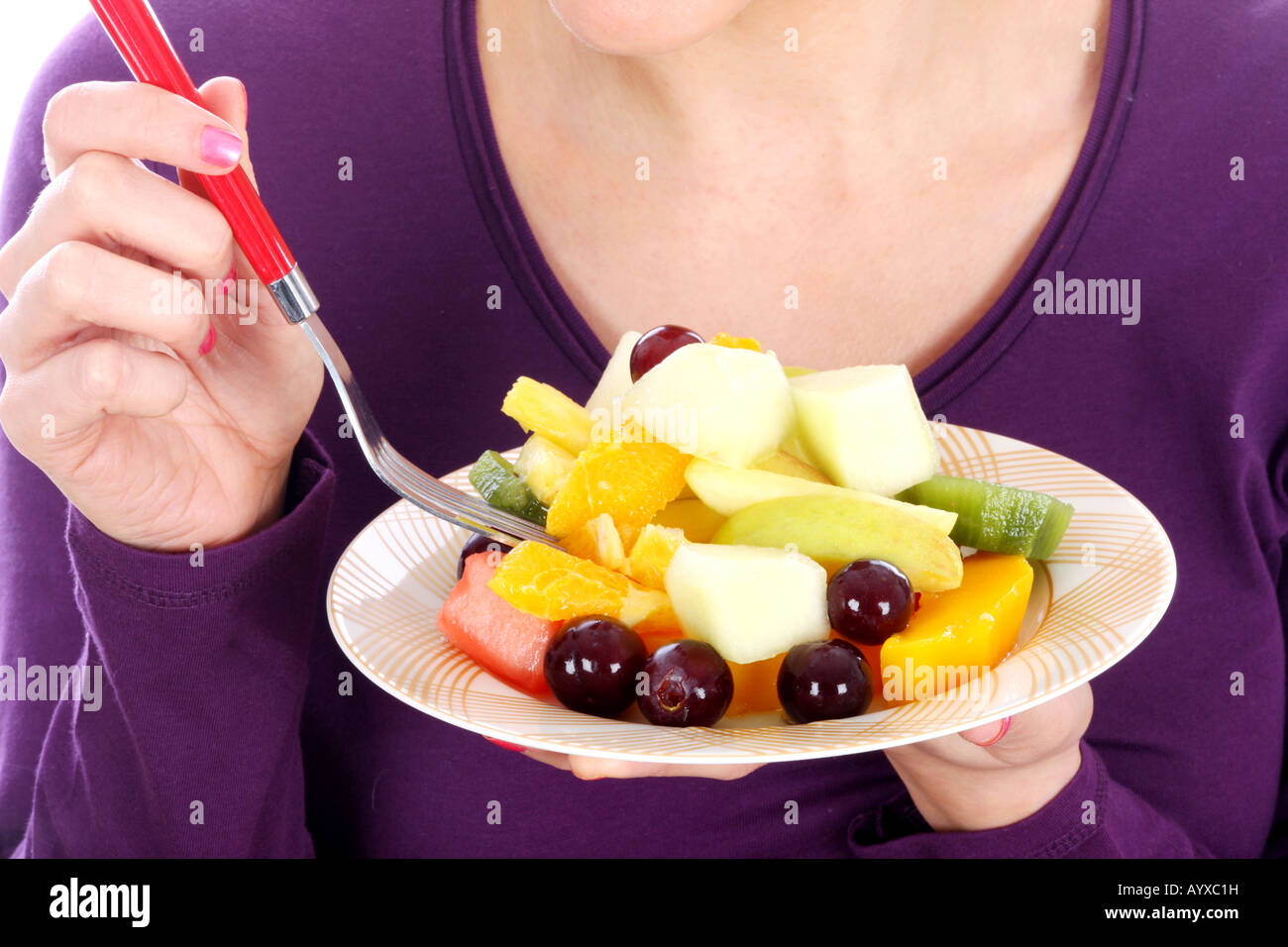 Young Woman Eating Fruit Salad Model Released Stock Photo - Alamy
