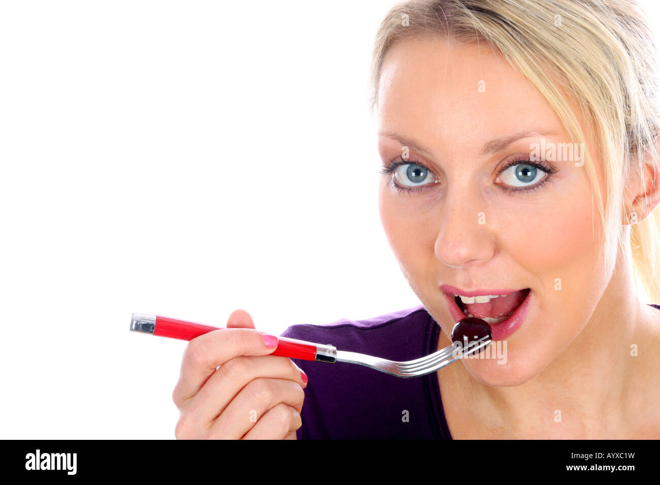 Young Woman Eating Red Grape Model Released Stock Photo - Alamy