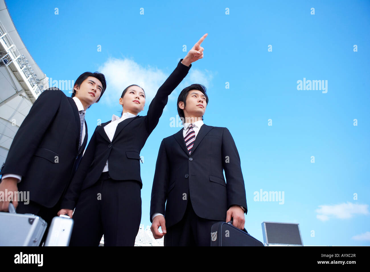 three person pointing out direction by a finger Stock Photo - Alamy