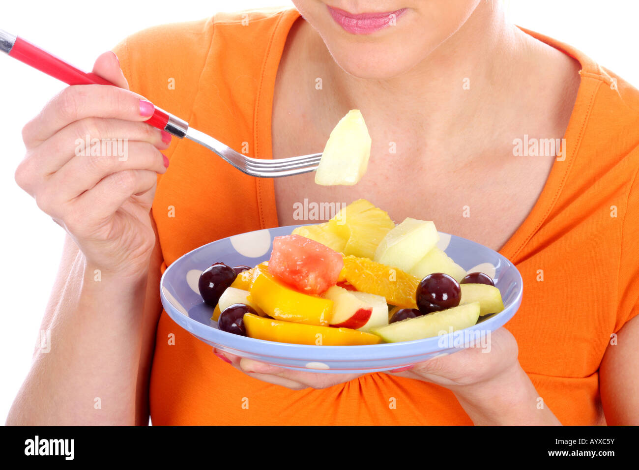 Young Woman Eating Fruit Salad Model Released Stock Photo - Alamy
