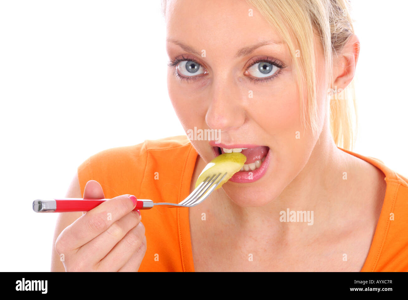 Young Woman Eating Slice of Apple Model Released Stock Photo - Alamy