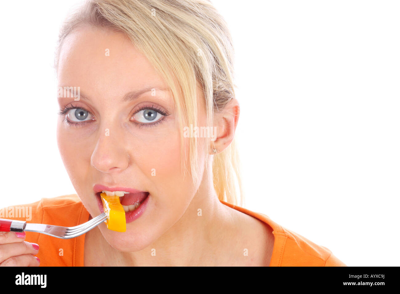 Young Woman Eating Mango Model Released Stock Photo - Alamy