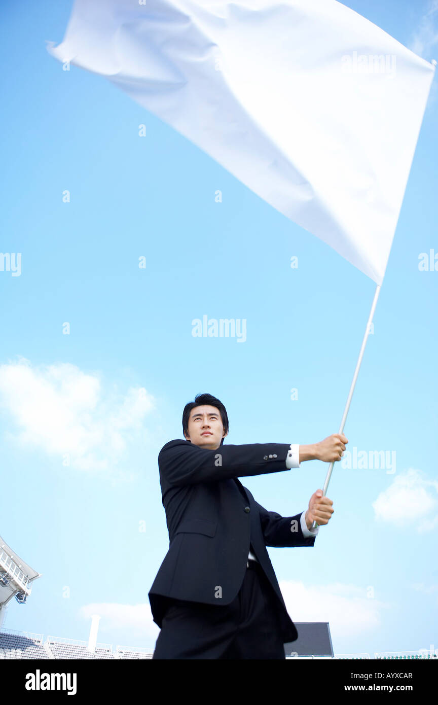 a man shaking flag Stock Photo - Alamy