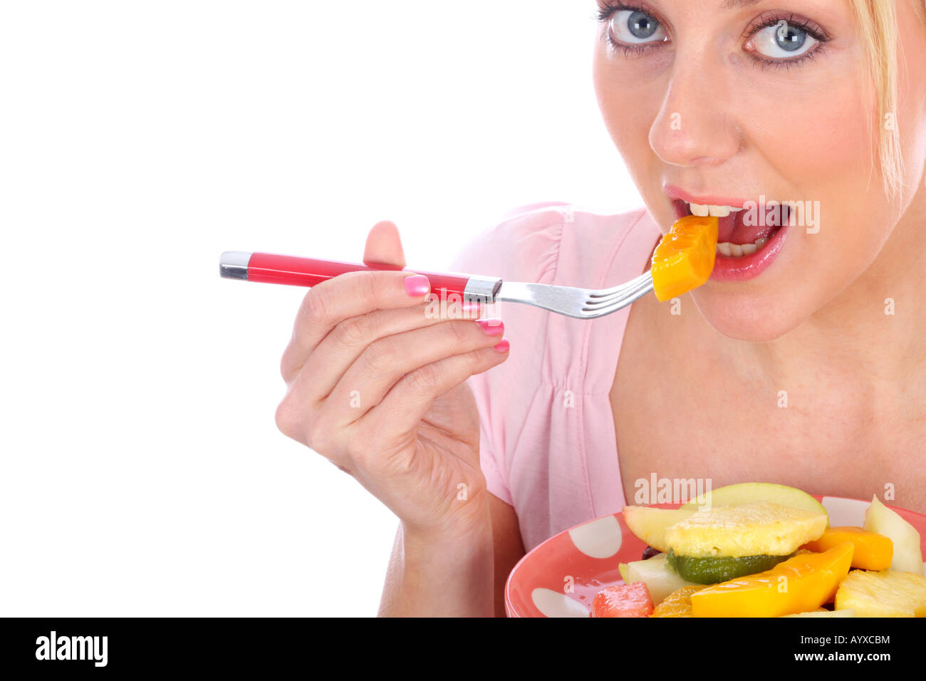 Young Woman Eating Fruit Salad Model Released Stock Photo - Alamy