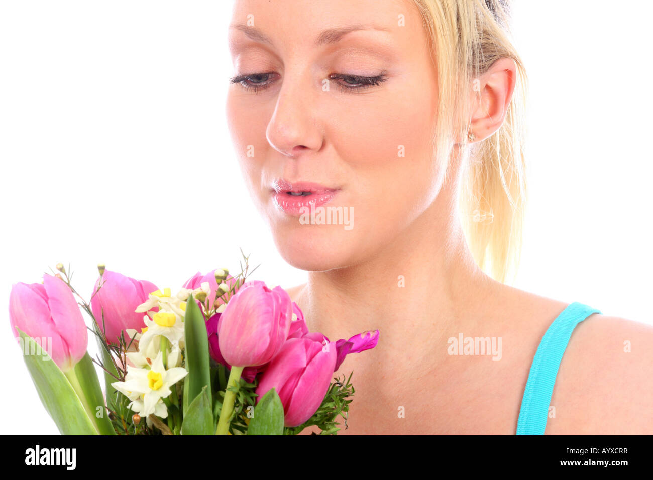 Young Woman Holding Bunch of Flowers Model Released Stock Photo - Alamy