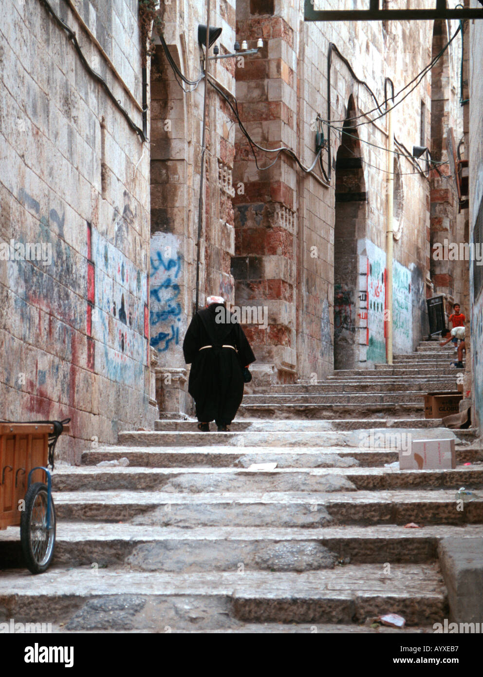 Monk walking up stairs hi-res stock photography and images - Alamy