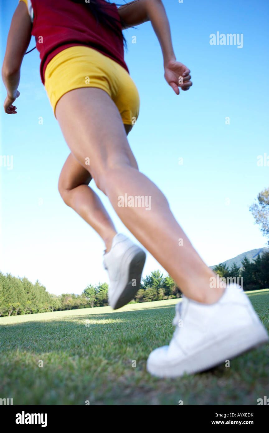 woman's back view running Stock Photo - Alamy