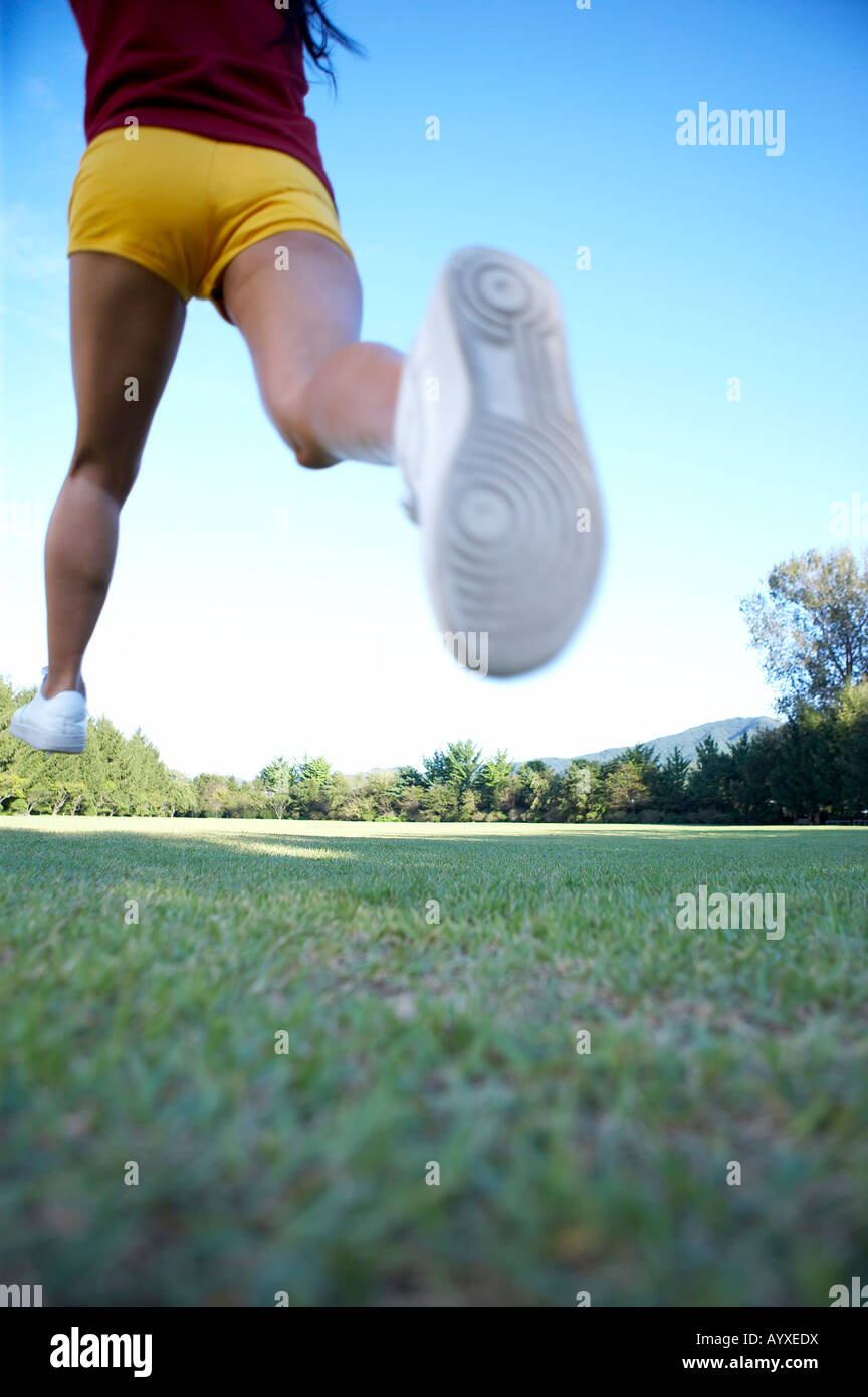 woman's back view running Stock Photo - Alamy