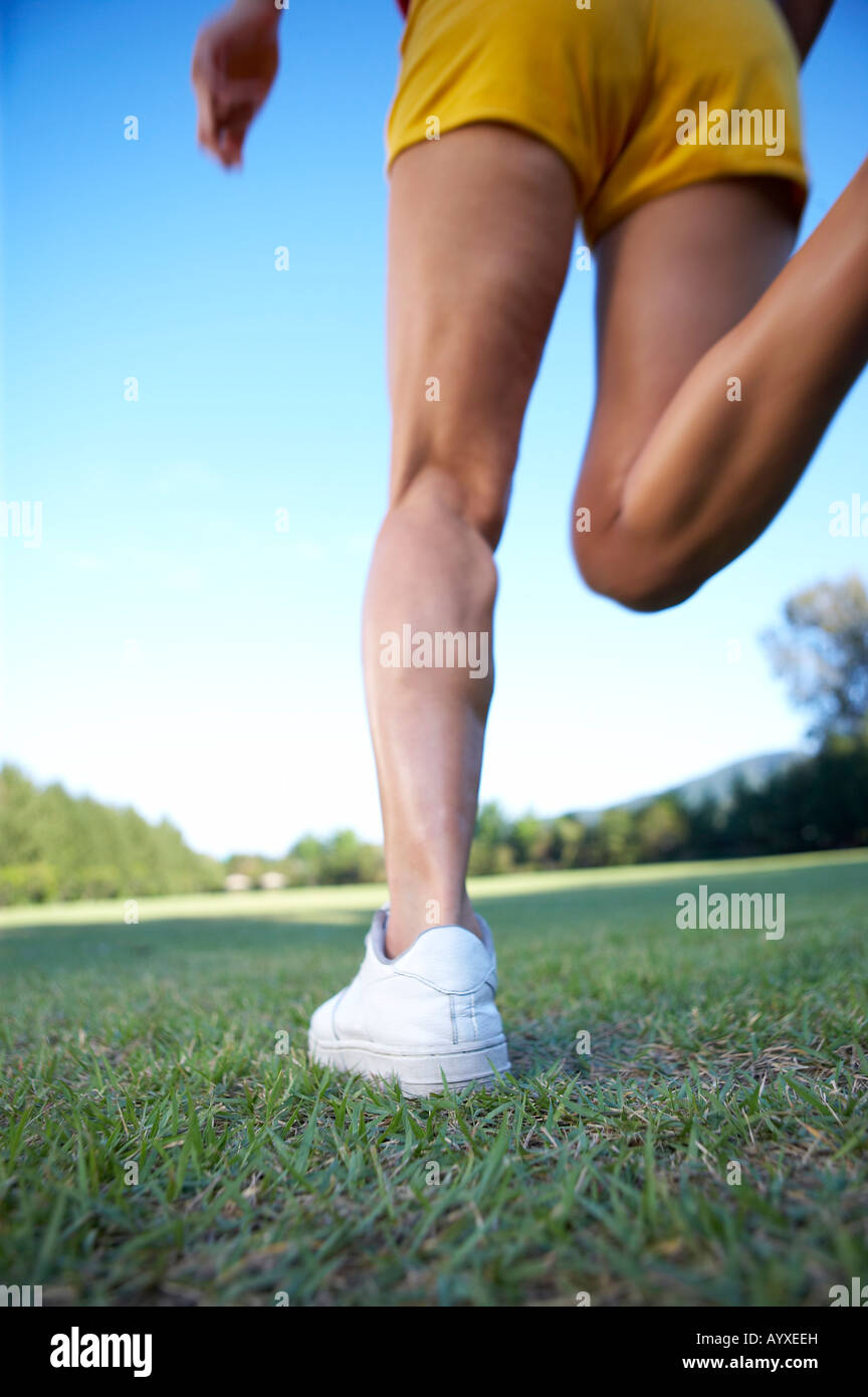 woman's back view running Stock Photo - Alamy