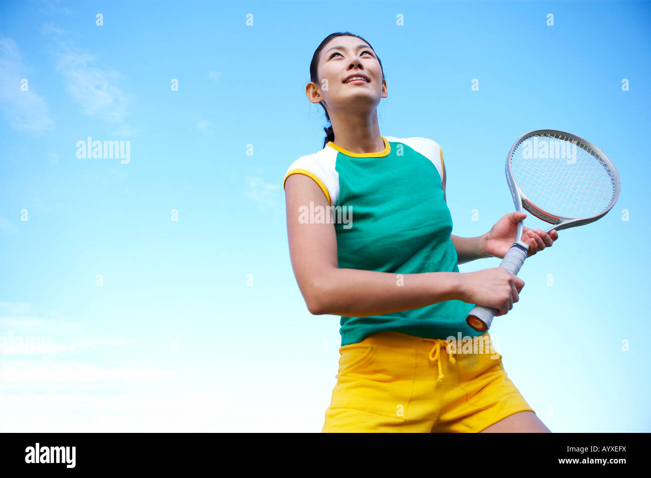 woman holding with tennis racket Stock Photo - Alamy