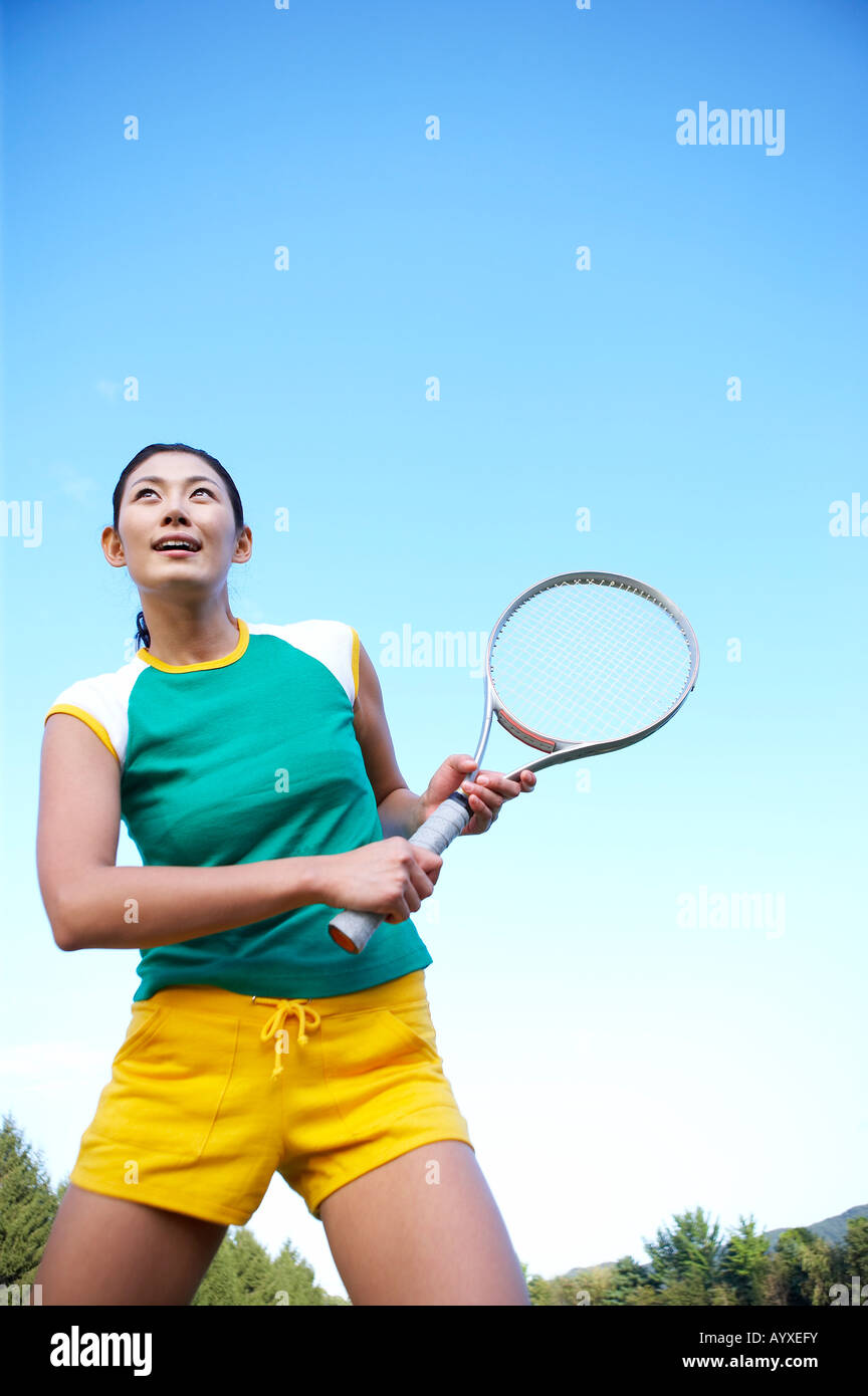 woman holding with tennis racket Stock Photo - Alamy