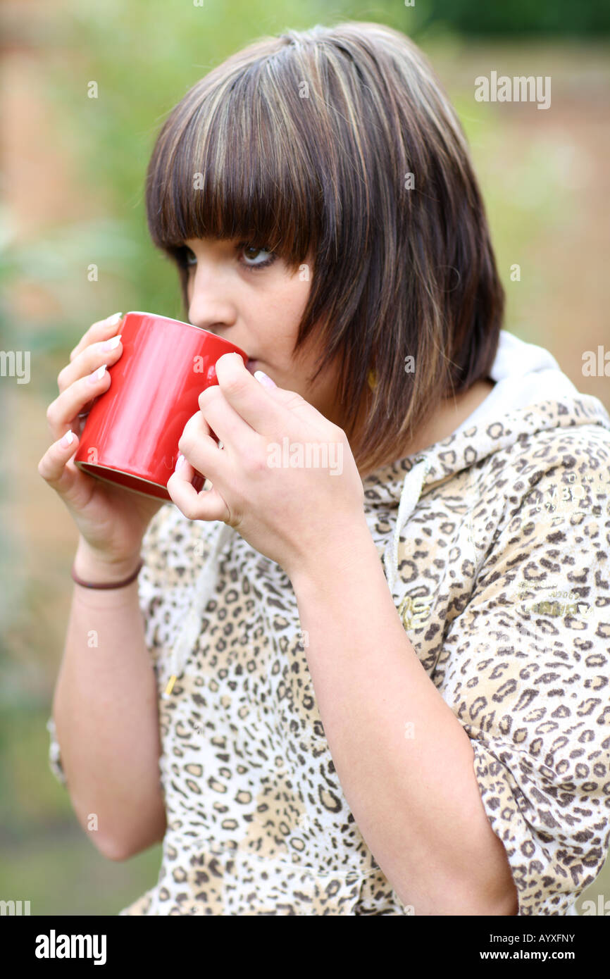 Teenage Girl Drinking Tea Model Released Stock Photo - Alamy