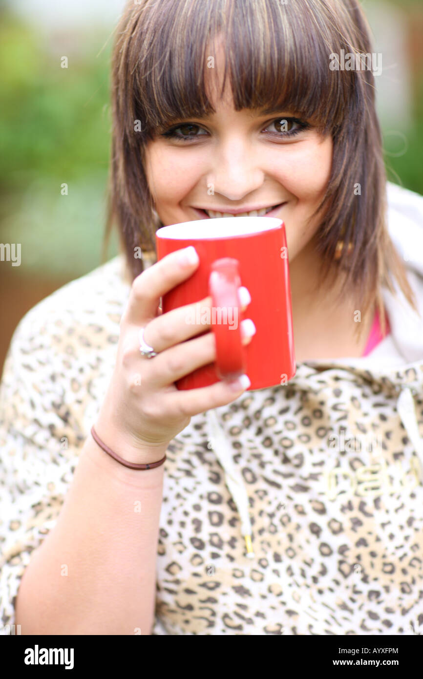 Teenage Girl Drinking Tea Model Released Stock Photo - Alamy