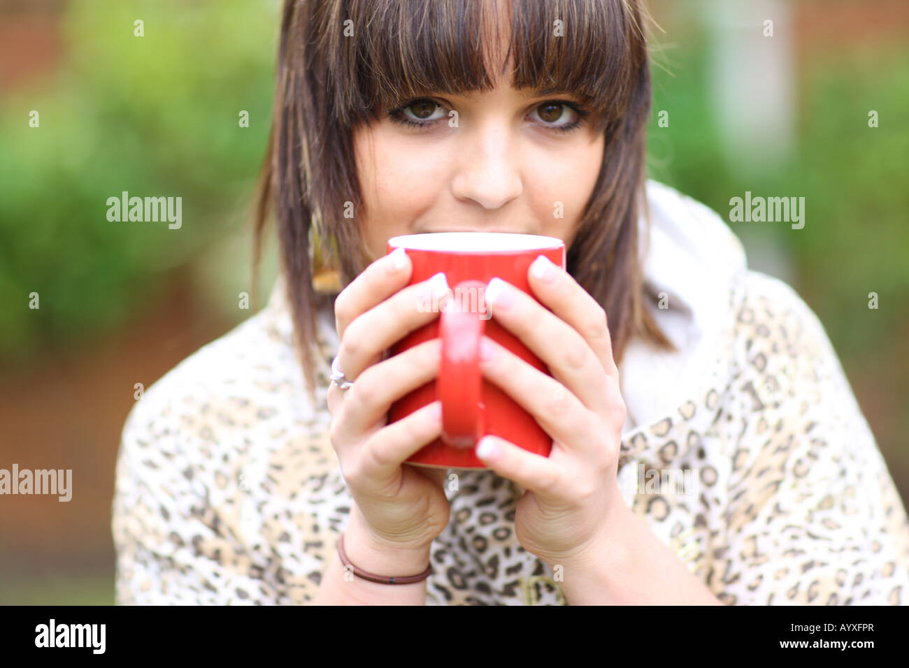 Teenage Girl Drinking Tea Model Released Stock Photo - Alamy