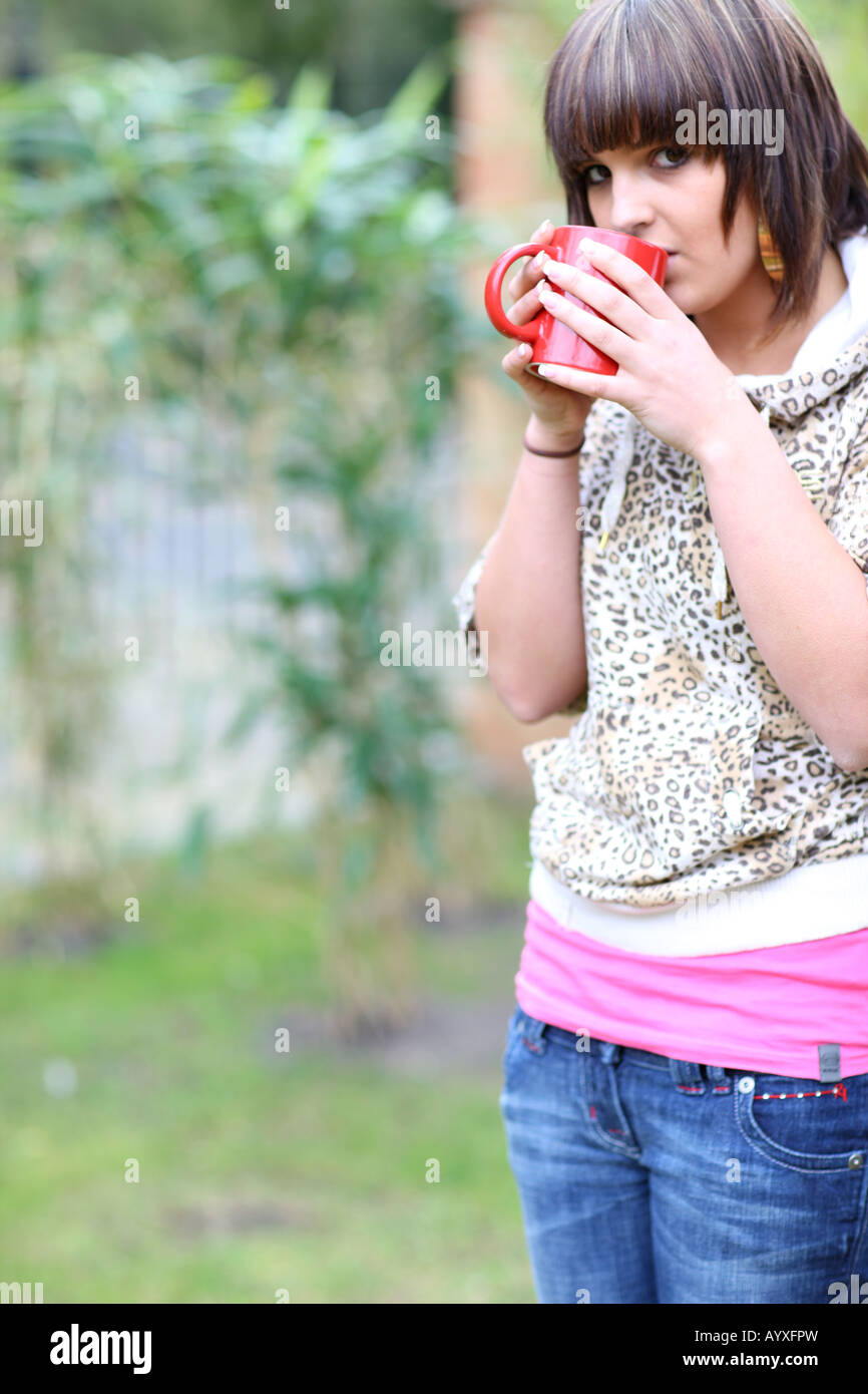 Teenage Girl Drinking Tea Model Released Stock Photo - Alamy