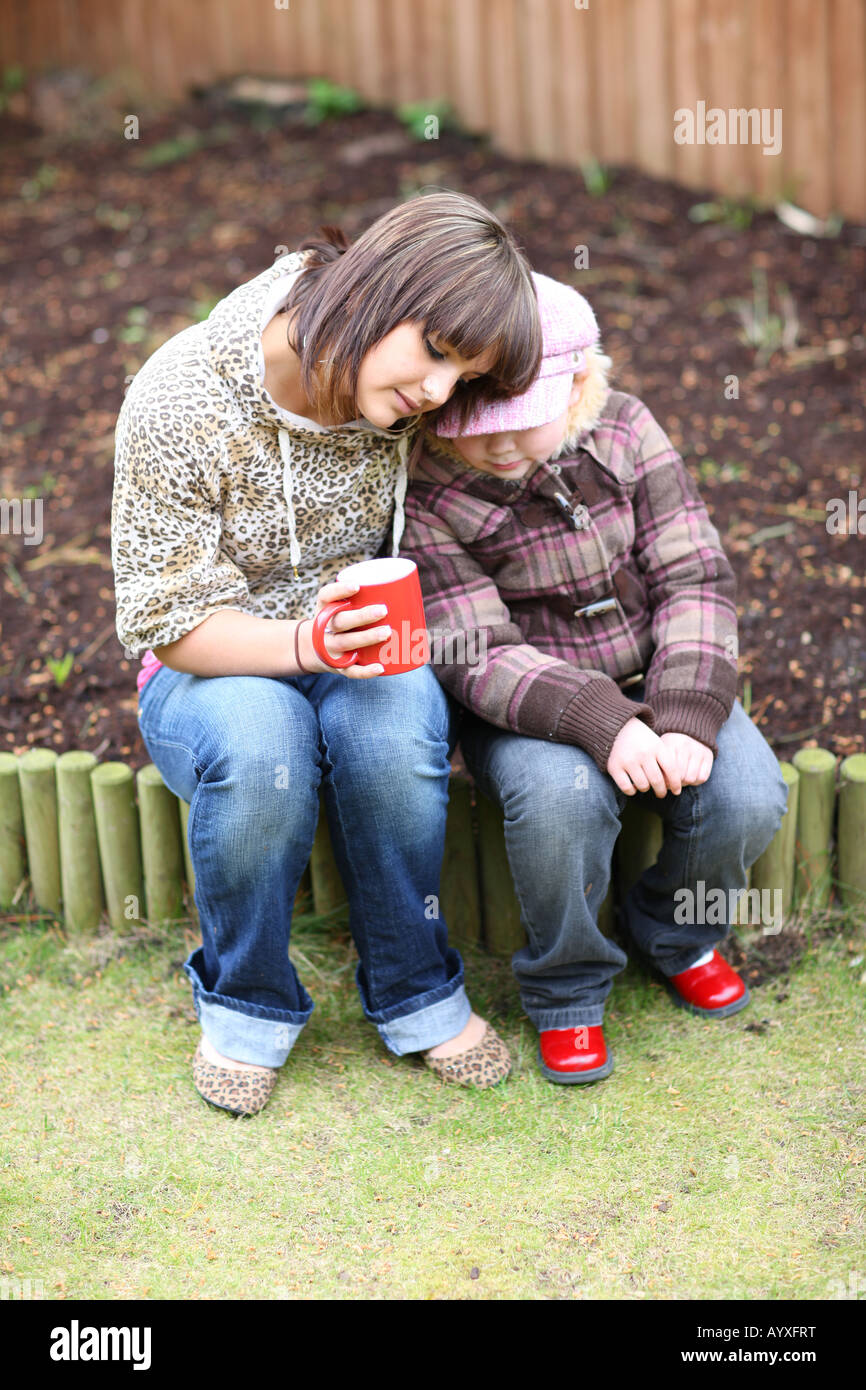 Sisters Talking Models Released Stock Photo - Alamy
