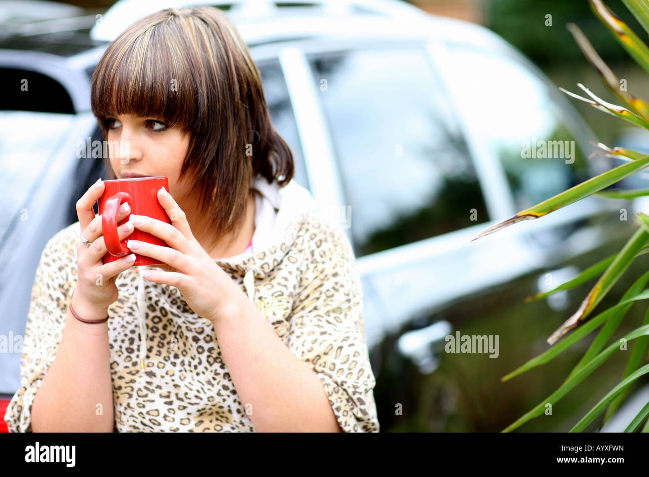 Teenage Girl Drinking Tea Model Released Stock Photo - Alamy